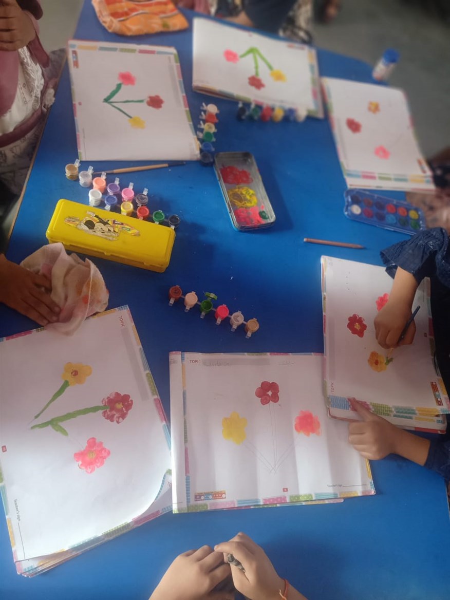 Thumb colouring activity U. K. G. (Tulip)